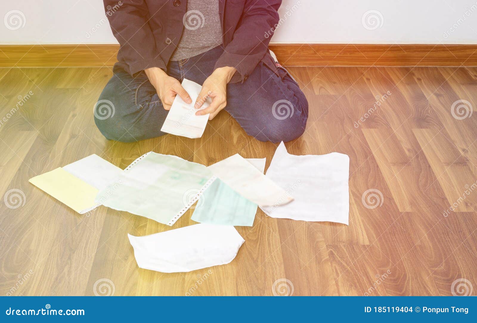 Man Checking and Reading Bills on the Floor Stock Photo - Image of ...