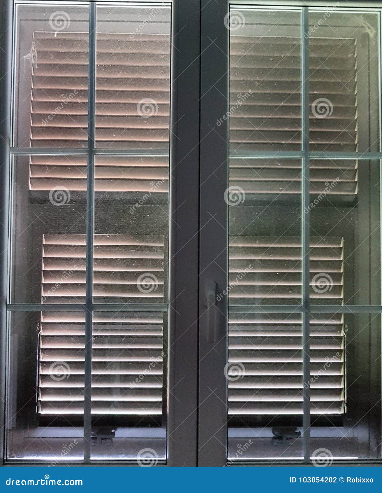 Light that Filters between the Closed Shutters Stock Photo - Image of ...