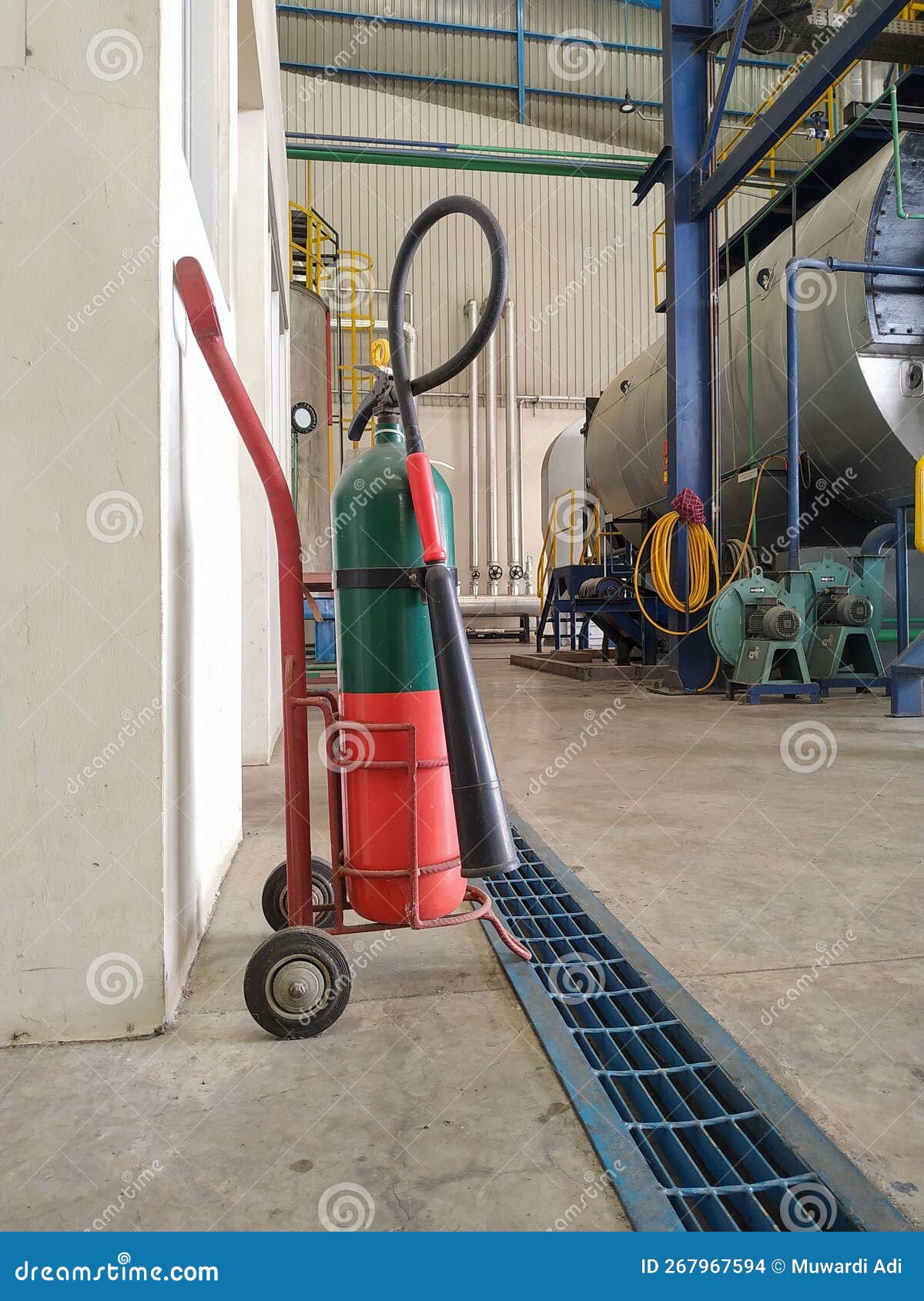 A Light Fire Extinguisher Placed in a Boiler Room Stock Photo - Image ...