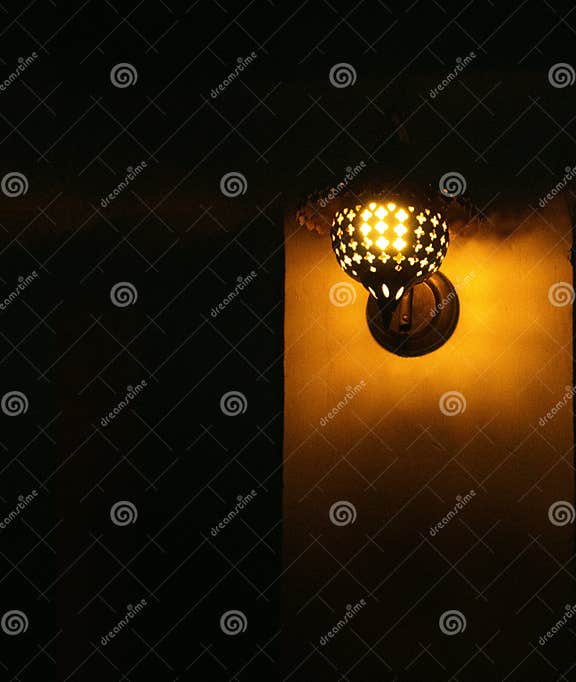 Light Fixture Casting Illumination on a Textured Wall. Stock Image ...