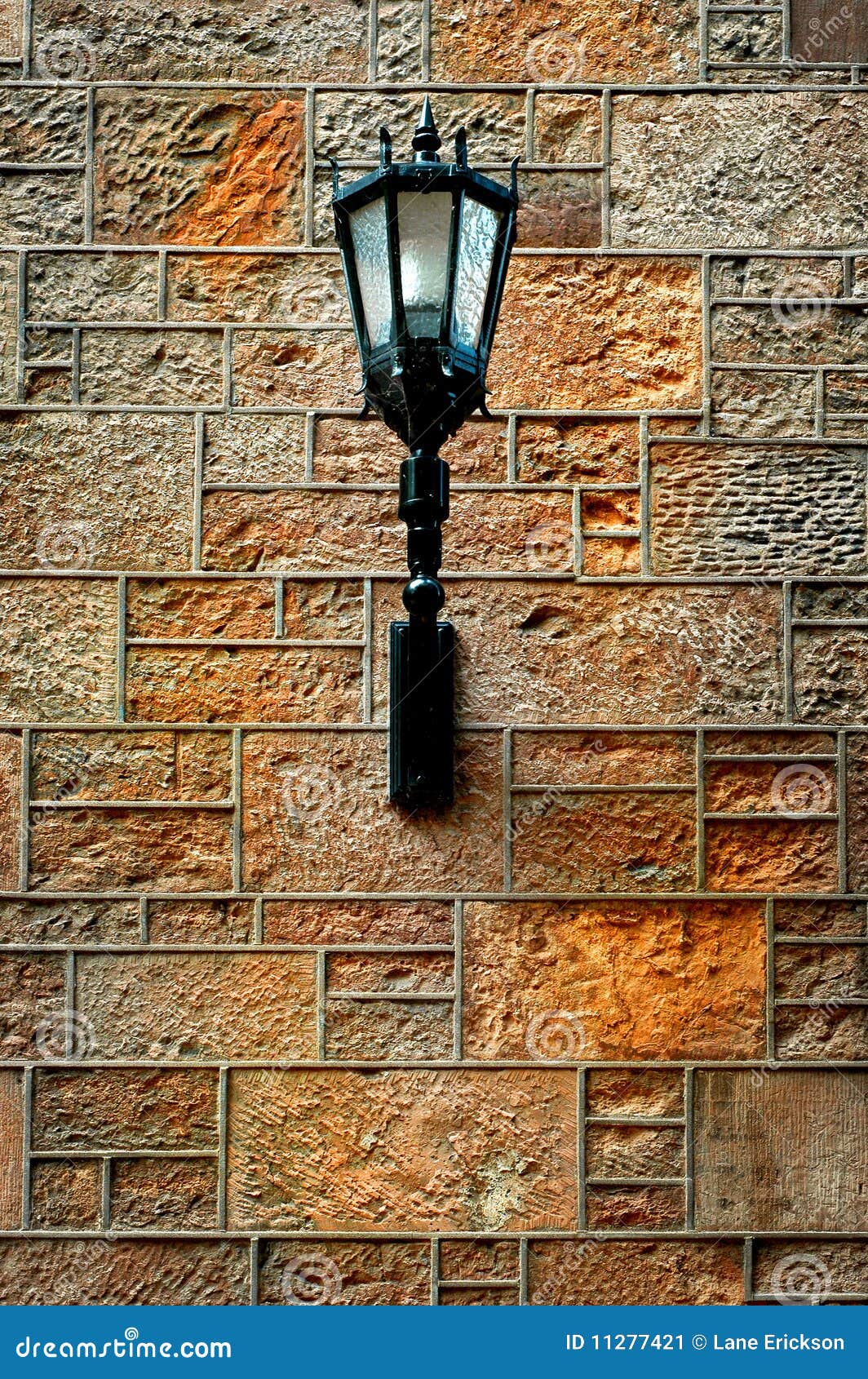 Light Fixture on Stone Wall Stock Image - Image of iron, mounted: 11277421