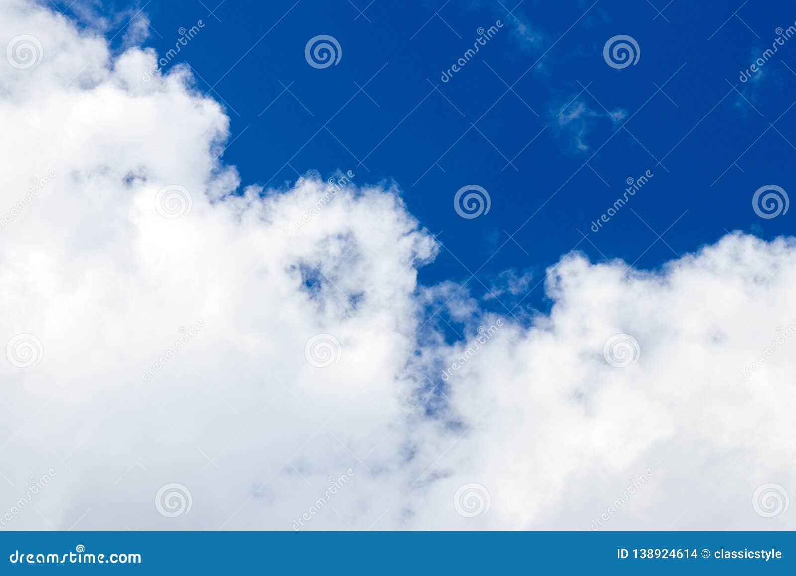 Light Fluffy Clouds Against a Blue Sky Stock Photo - Image of cloud ...