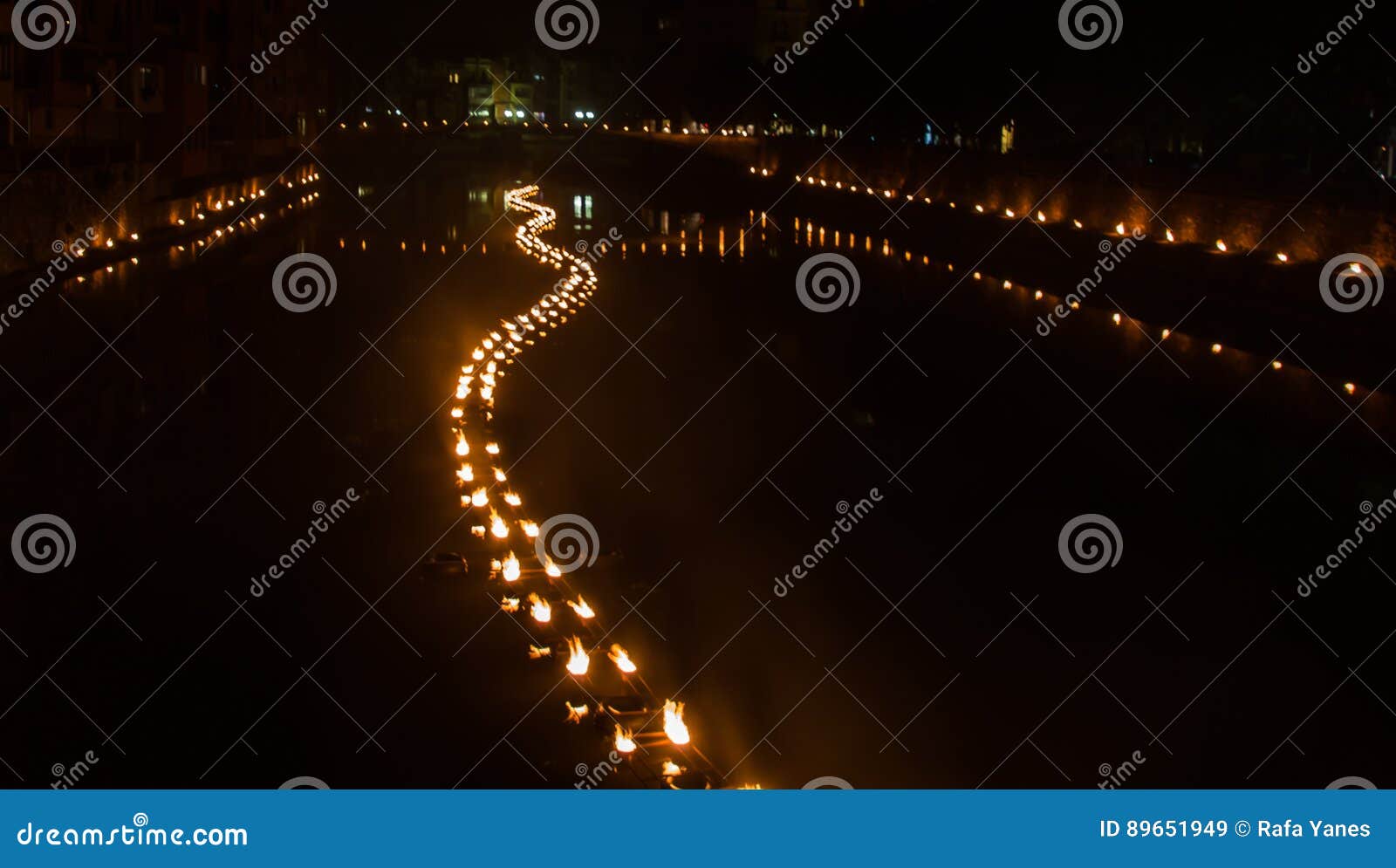 Light Forms a Serpent of Light in the River on a Dark Night Stock Image ...