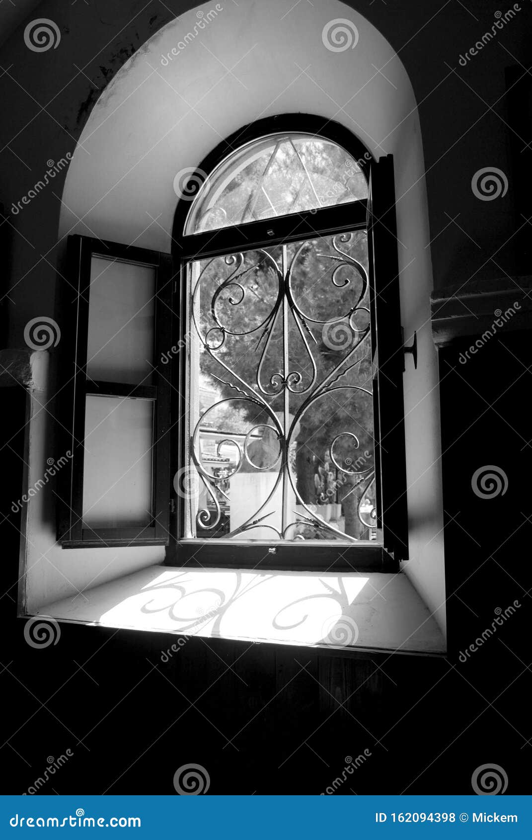 Arch Window in Shadows stock photo. Image of battlements - 162094398