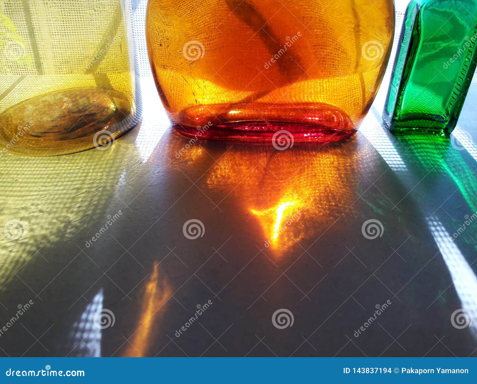 Light through Glass Bottles, Colourful Bottles Stock Photo - Image of ...