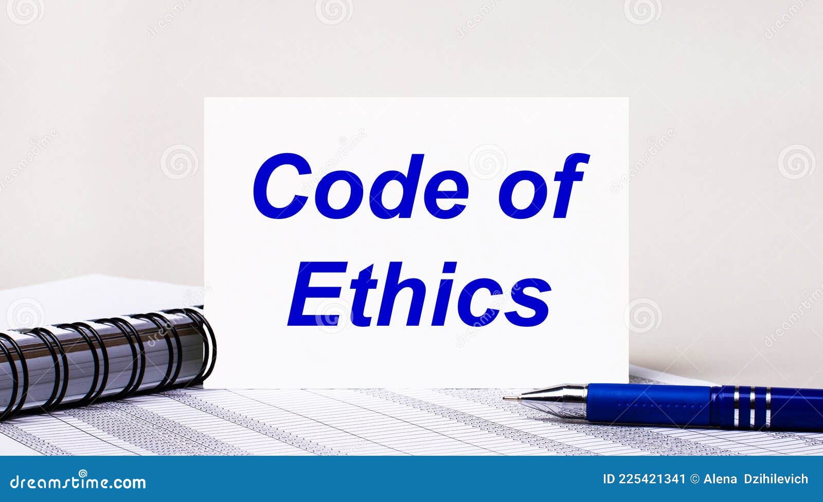 On a Light Gray Background, a Notebook, a Blue Pen and a Sheet of Paper ...