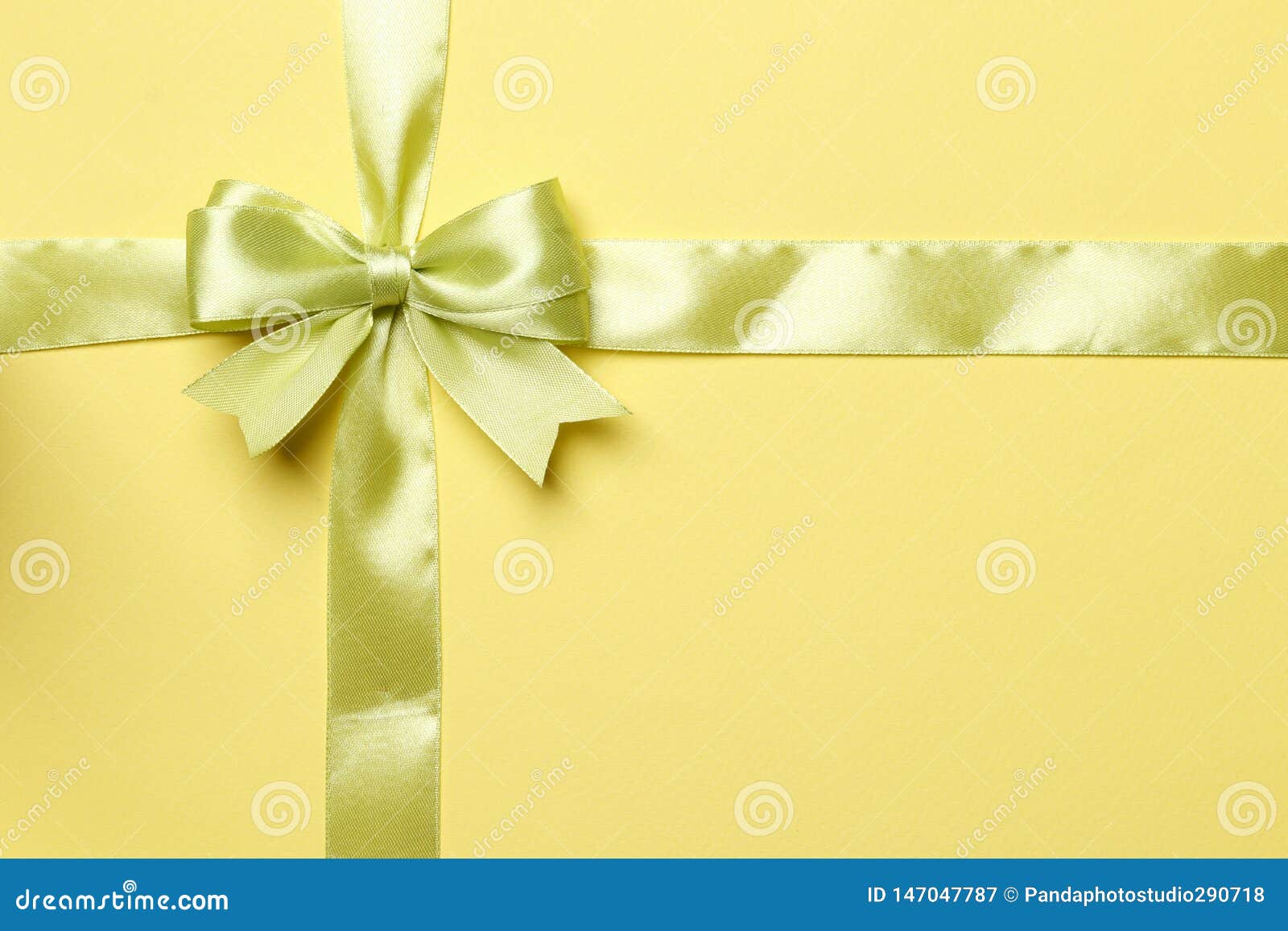 Light Green Ribbon and Bow on a Green Background Stock Image - Image of ...