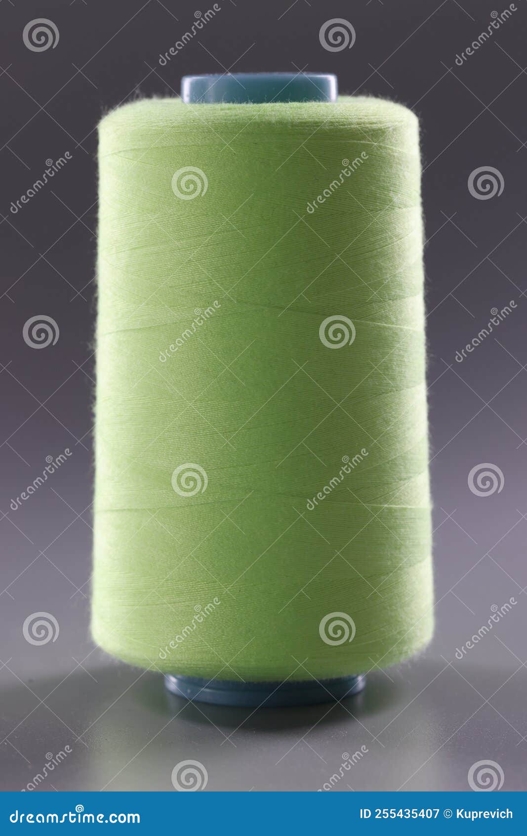 Light Green Spool of Thread on Gray Background Stock Image - Image of ...