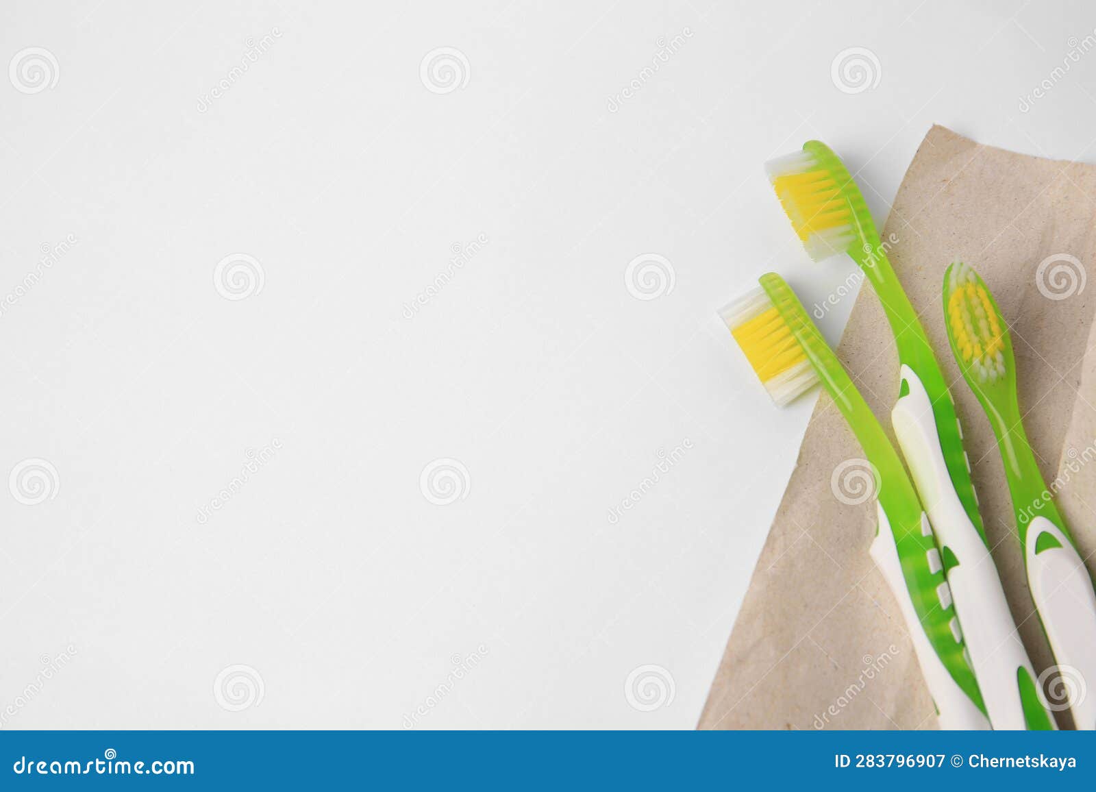 Light Green Toothbrushes on White Background, Top View. Space for Text ...