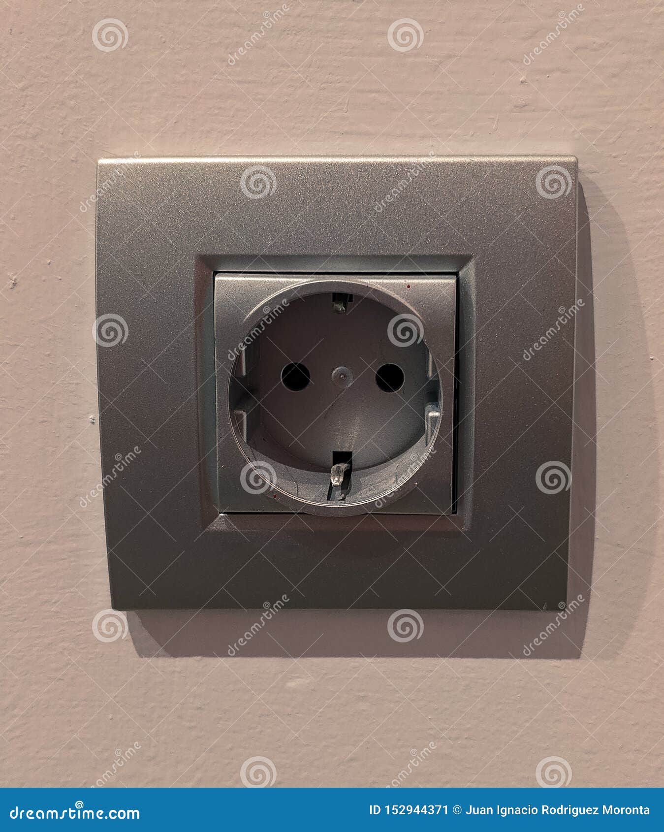 A light grey wall socket. stock image. Image of electric - 152944371