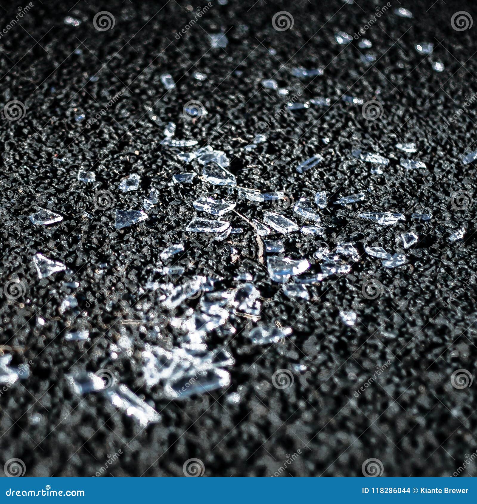 Broken glass on the street stock photo. Image of bang - 118286044