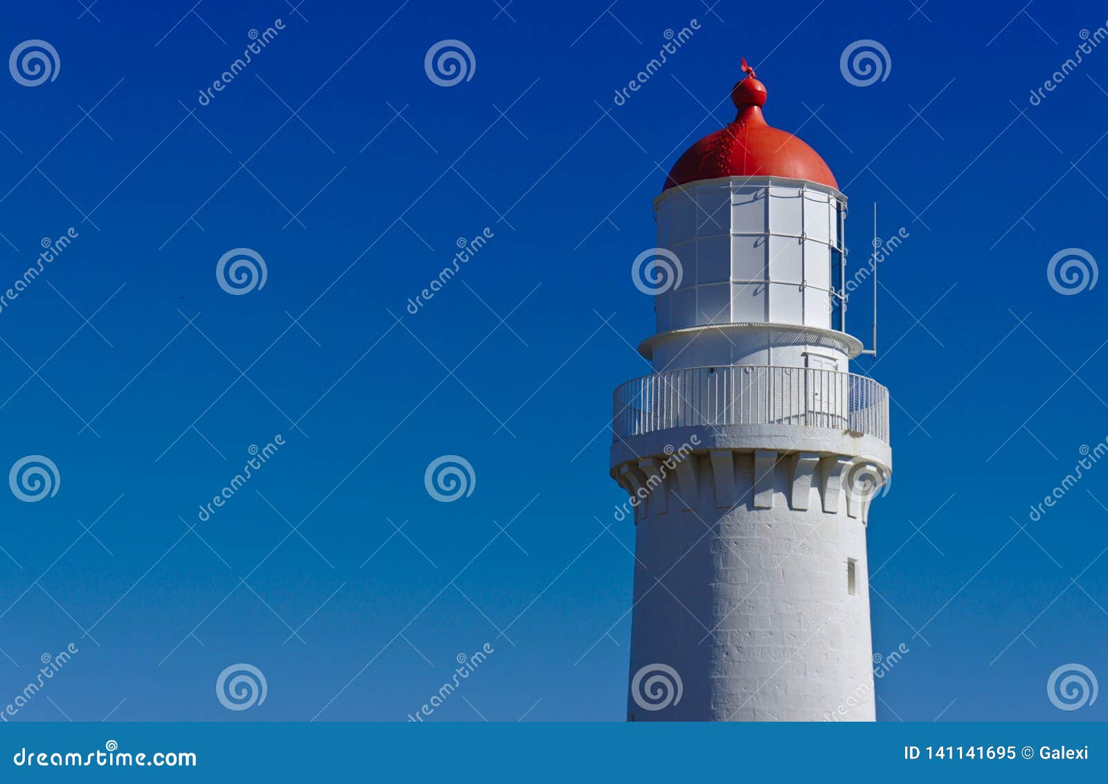 Light house with red roof stock image. Image of hover - 141141695