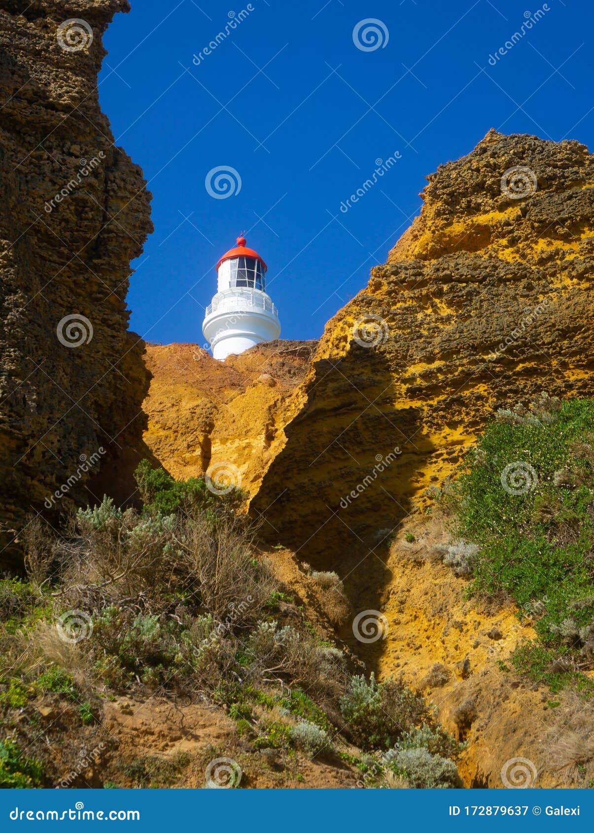 Light House on Yellow Cliff Stock Image - Image of shore, building ...