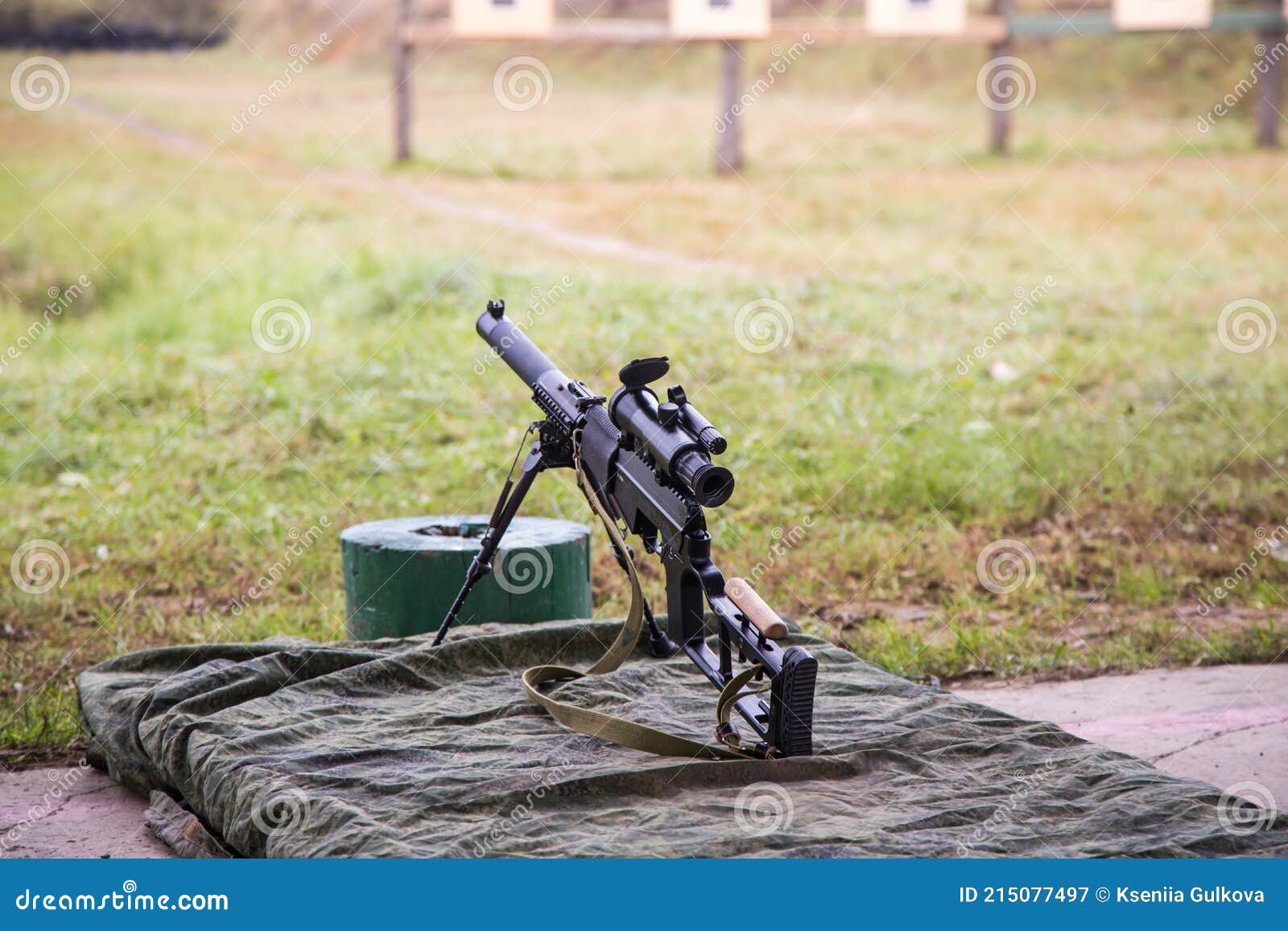 Light Machine Gun Lying on the Grass in a Shooting Range Stock Image ...