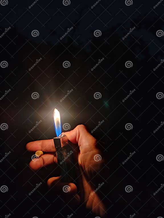 The Light of a Match is Lit in the Dark Night Stock Image - Image of ...