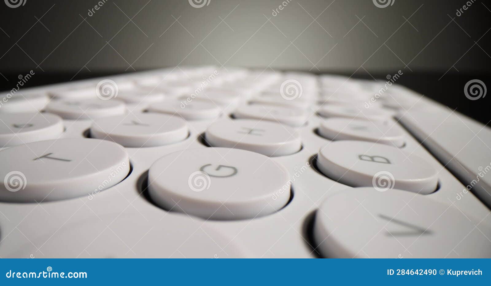 Light Modern Keyboard with Round Keys on Black Surface Stock Footage ...