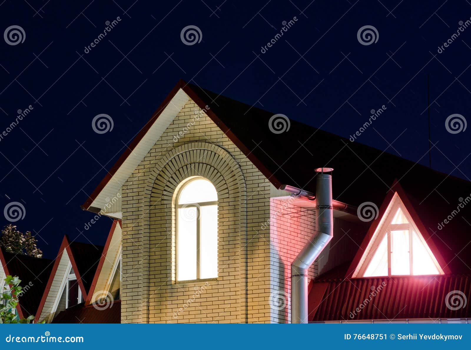 Light at the Night Arched Window on the Top Floor, the Pink Light of ...