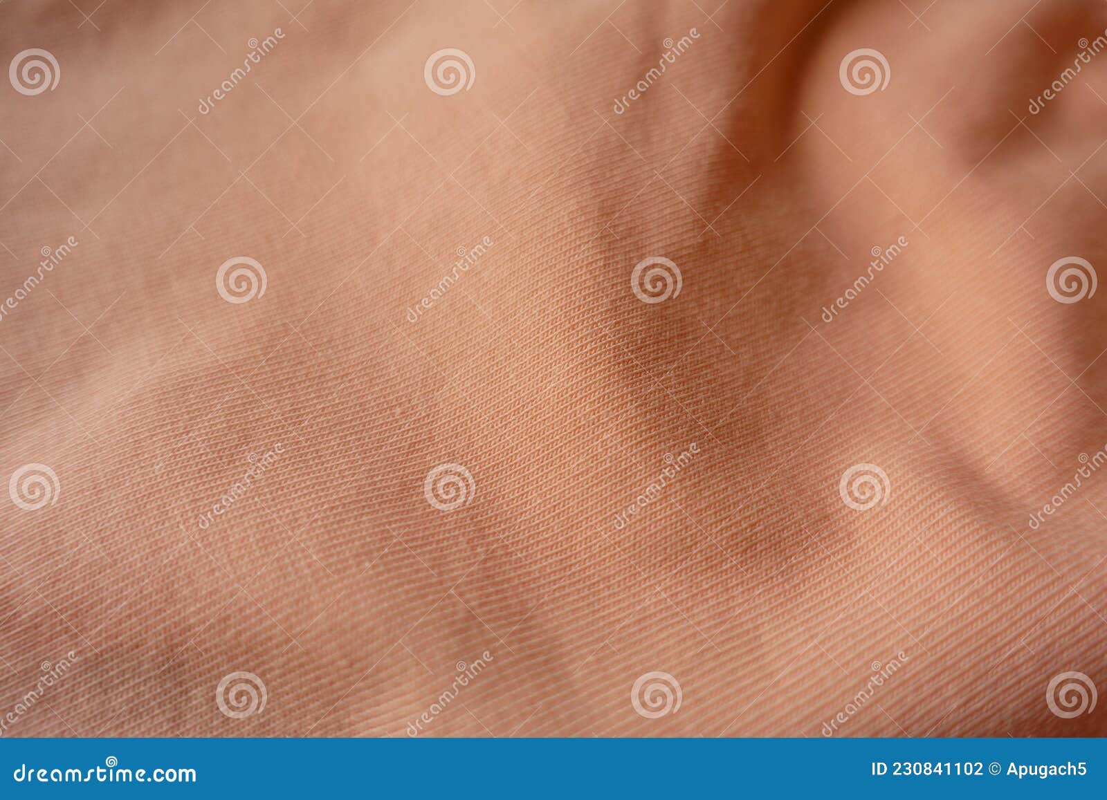 Light Orange Cotton Jersey Fabric with Soft Folds Stock Photo - Image ...