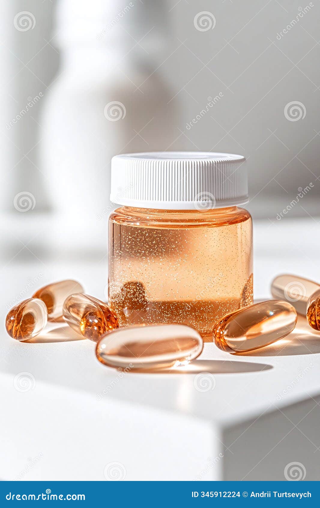 Light Orange Supplement Capsules and Clear Container on White Surface ...