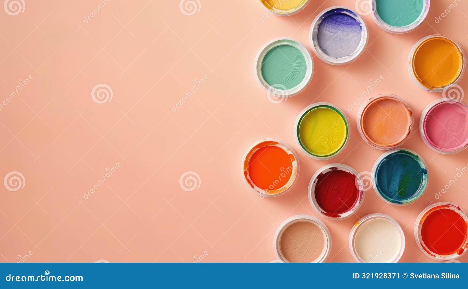 Light Peach Background Featuring a Set of Watercolor Paints with ...