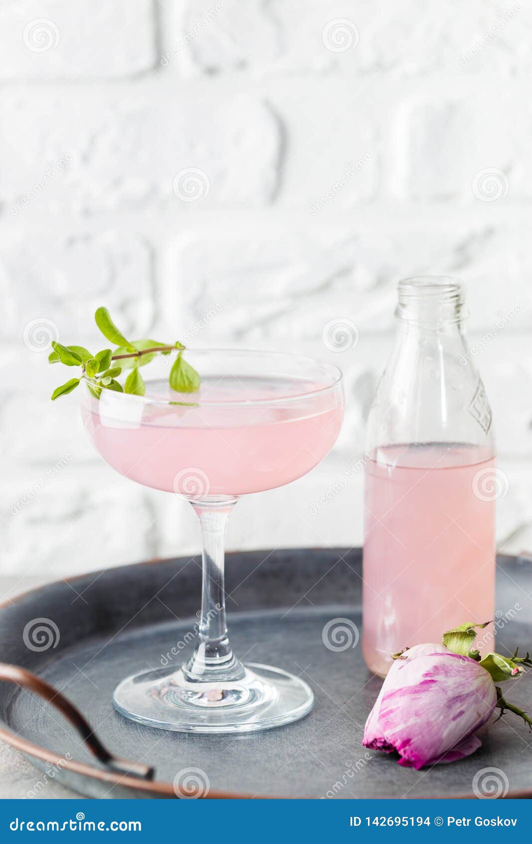 Light pink rose cocktail stock photo. Image of lemon - 142695194