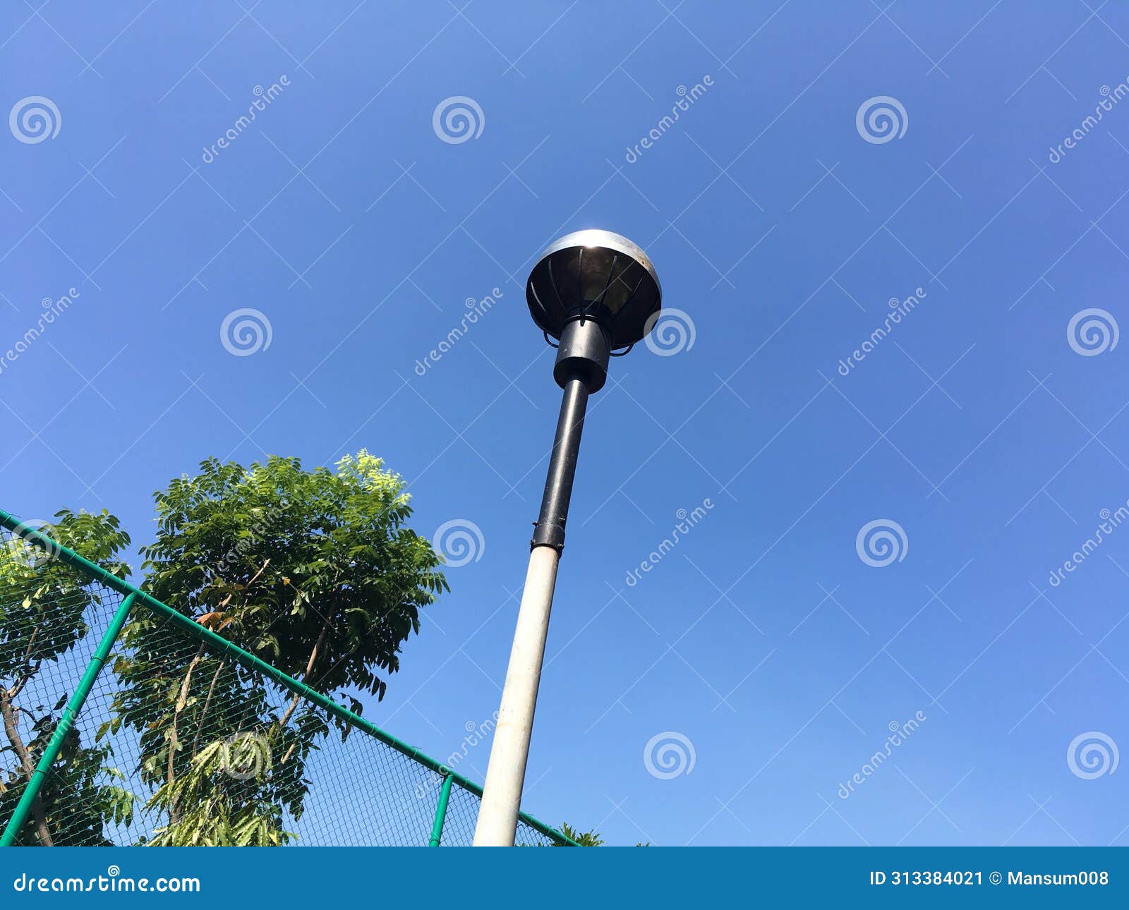 Light pole with blue sky stock image. Image of energy - 313384021