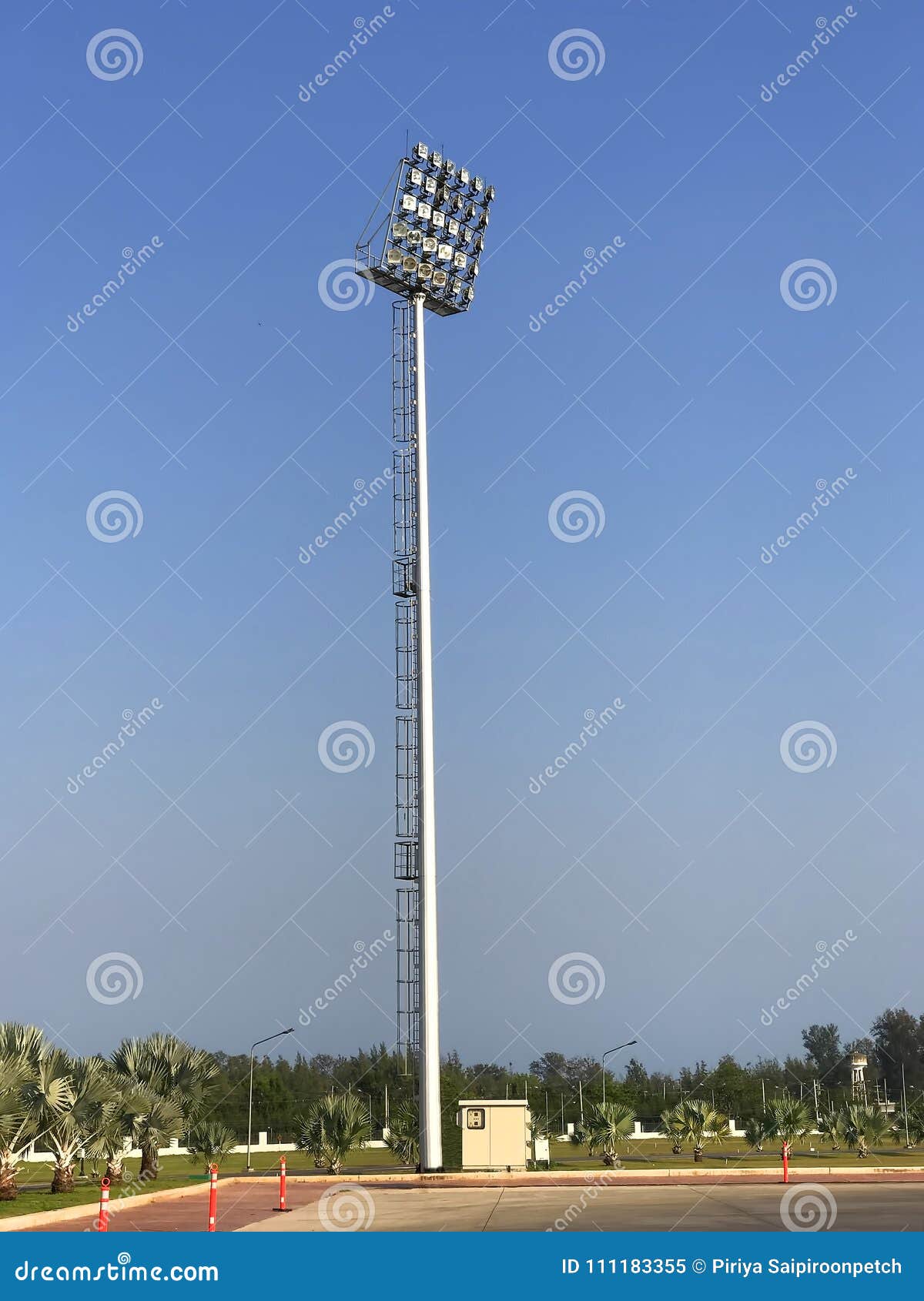Light Pole Tower in Field on Blue Sky. Stock Image - Image of light ...