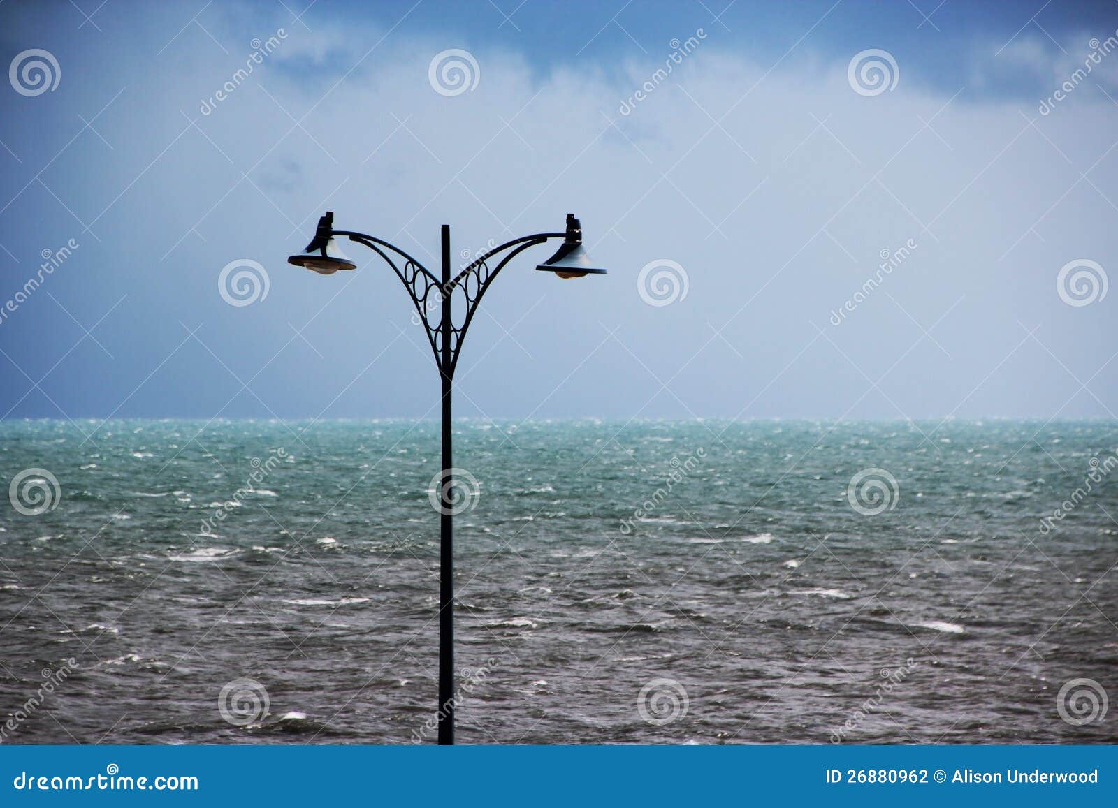 Light Poles at the Beach on a Stormy Day Stock Photo - Image of wind ...