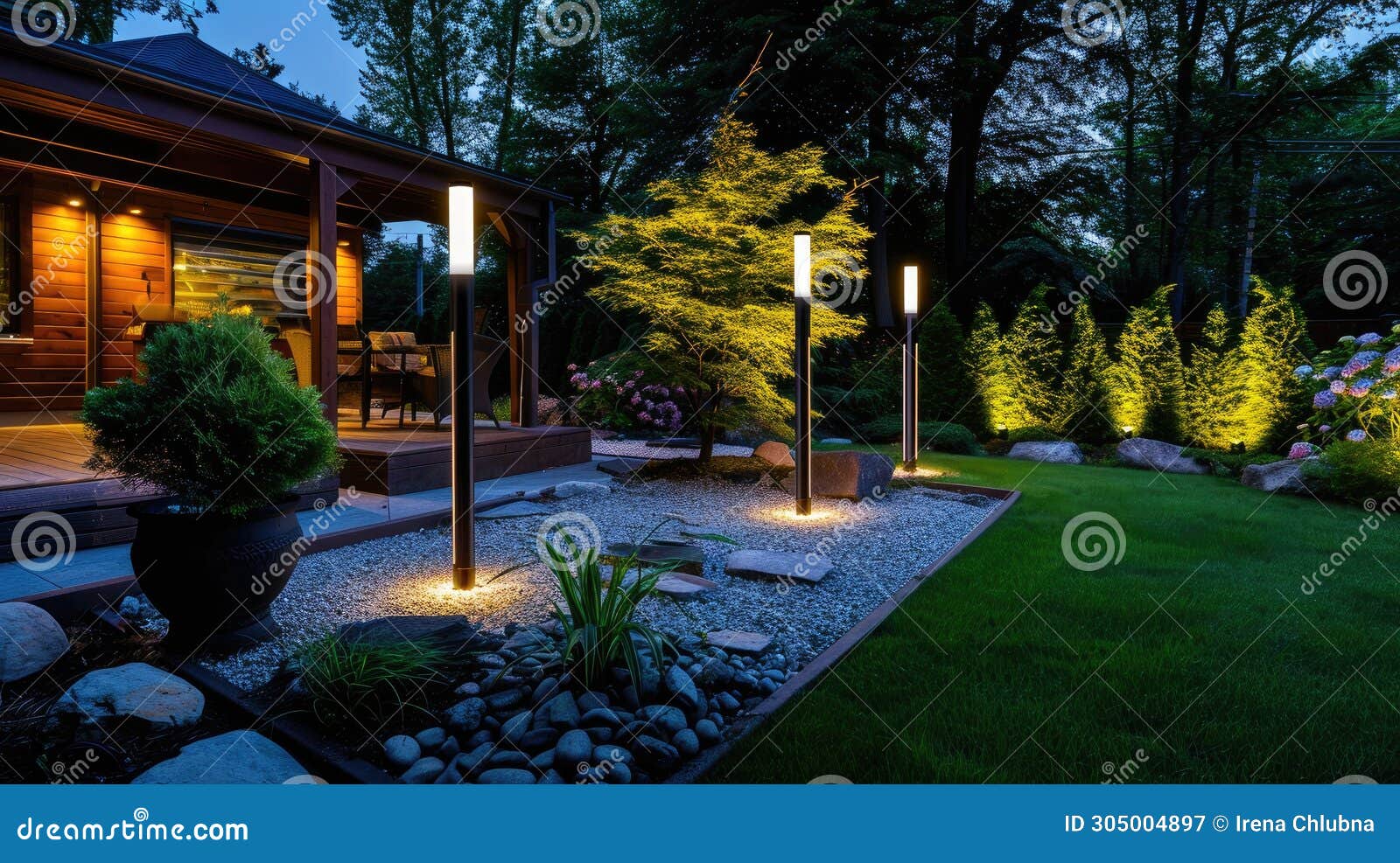 Light Posts Illuminated Backyard Garden during Night Hours. Modern ...
