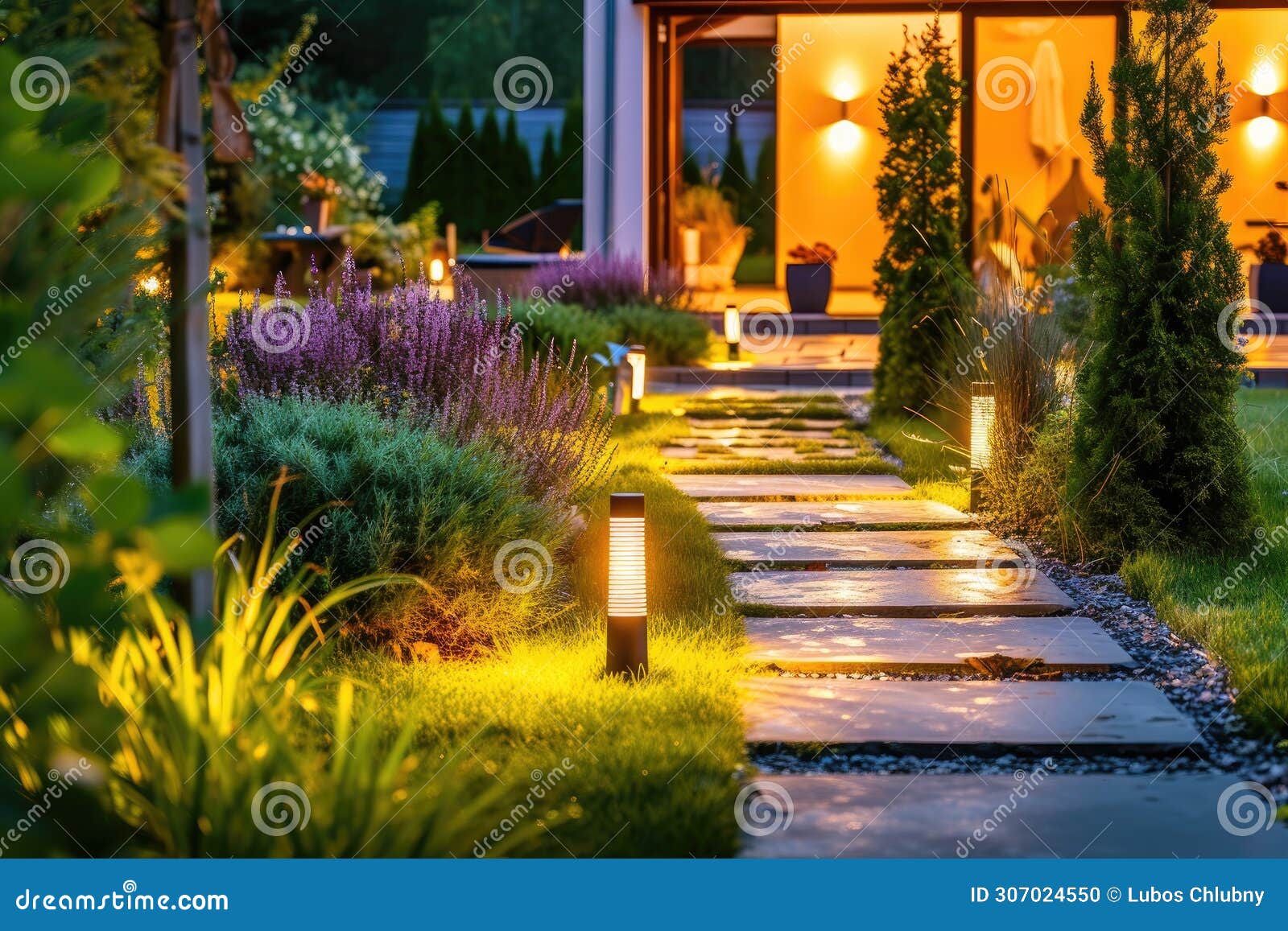 Light Posts Illuminated Backyard Garden during Night Hours. Modern ...