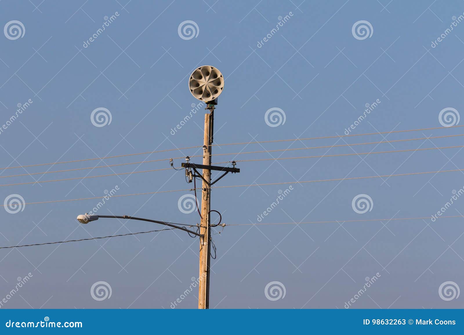 Light, Power Lines and Civil Defense on a Pole Stock Image - Image of ...