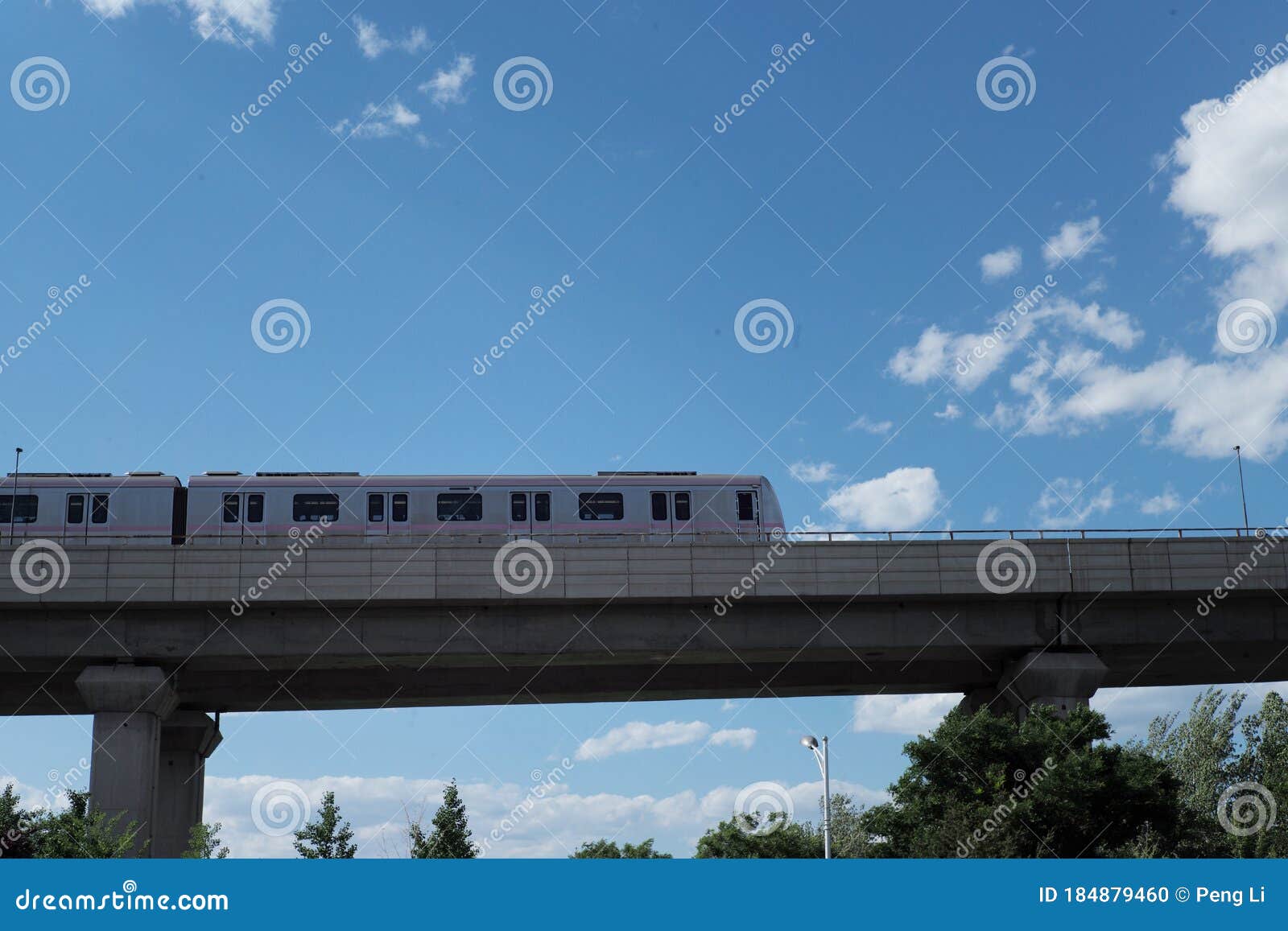 A Light Rail Train Running Over a Bridge Stock Photo - Image of beijing ...