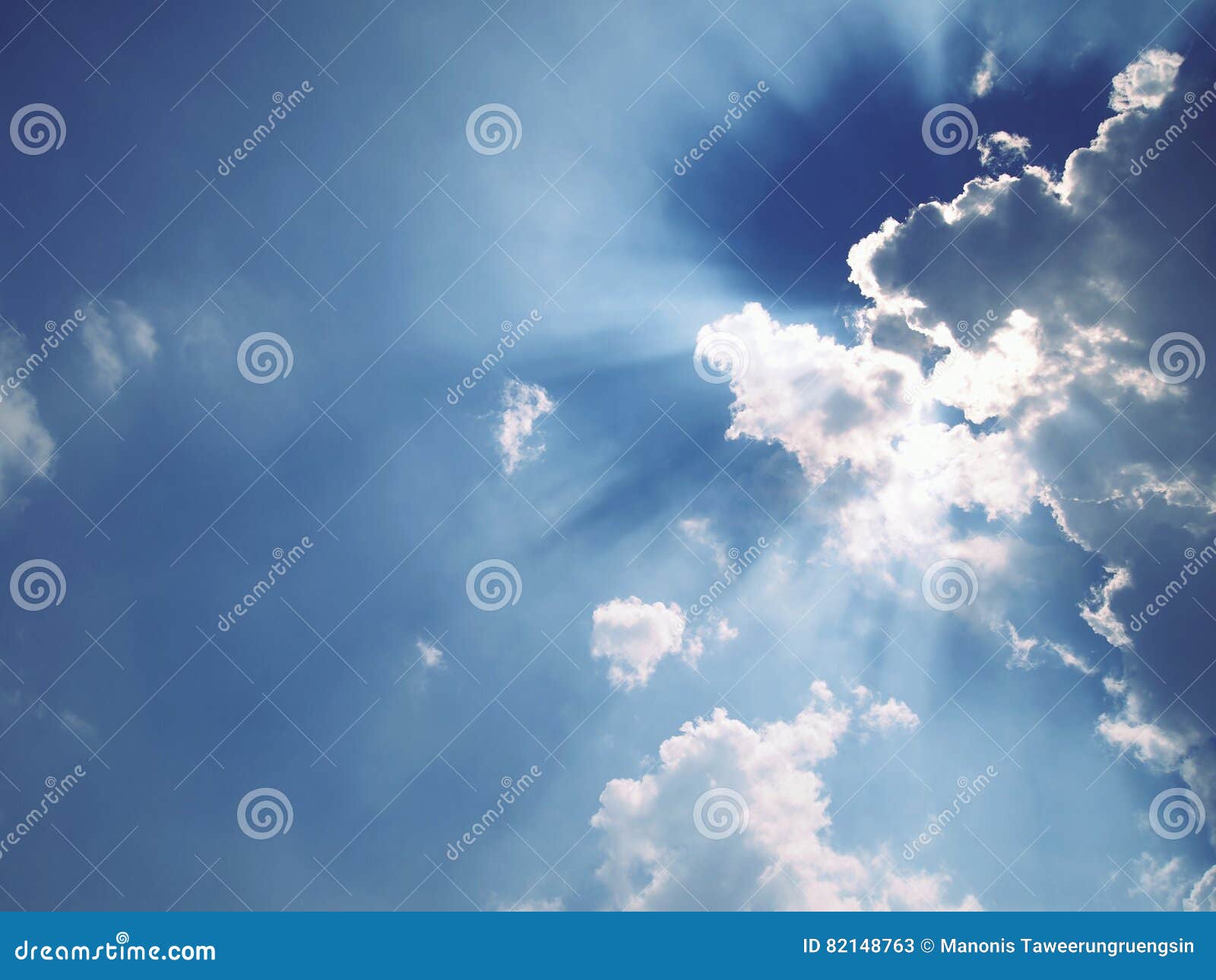 Light Ray from Sun Behind Cloud in the Blue Sky Stock Image - Image of ...