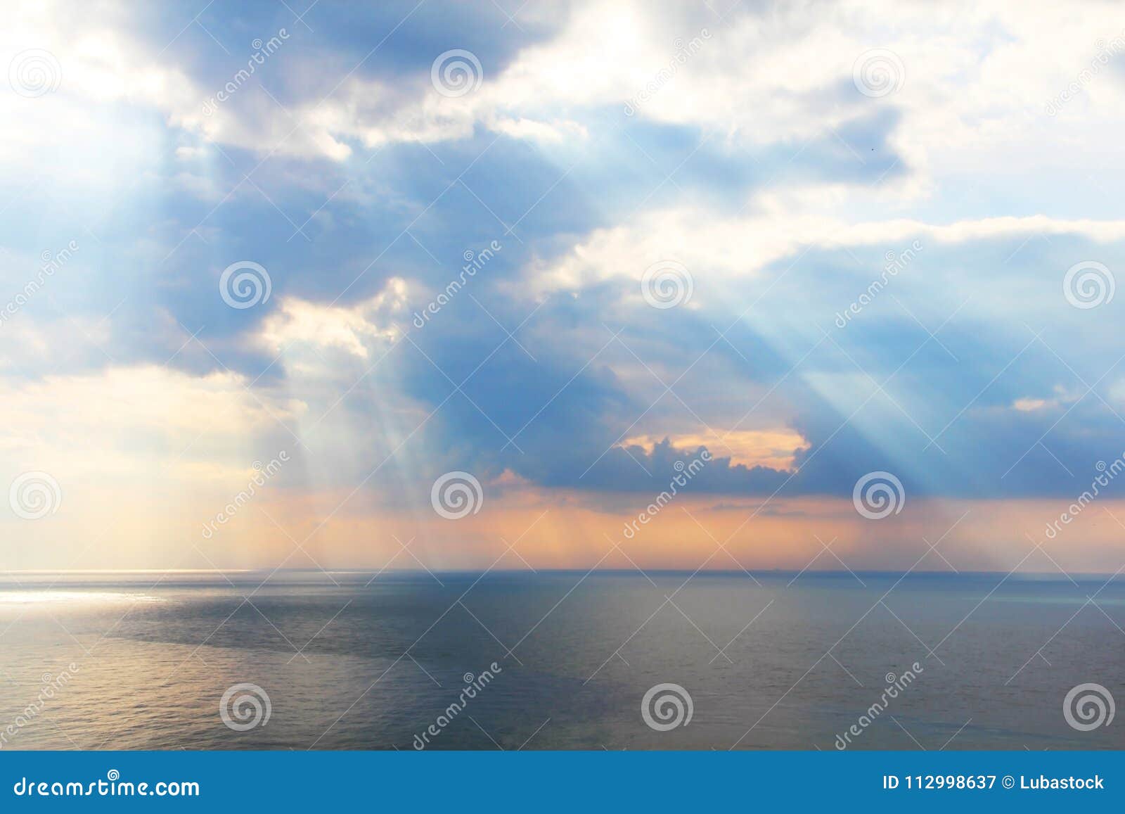 Light Rays through the Clouds Over Sea Stock Image - Image of spiritual ...