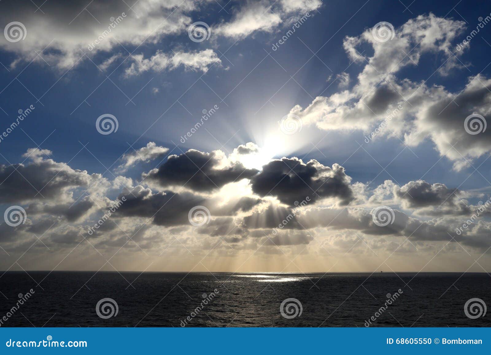 Light Rays Shine through the Group of Clouds Stock Photo - Image of ...