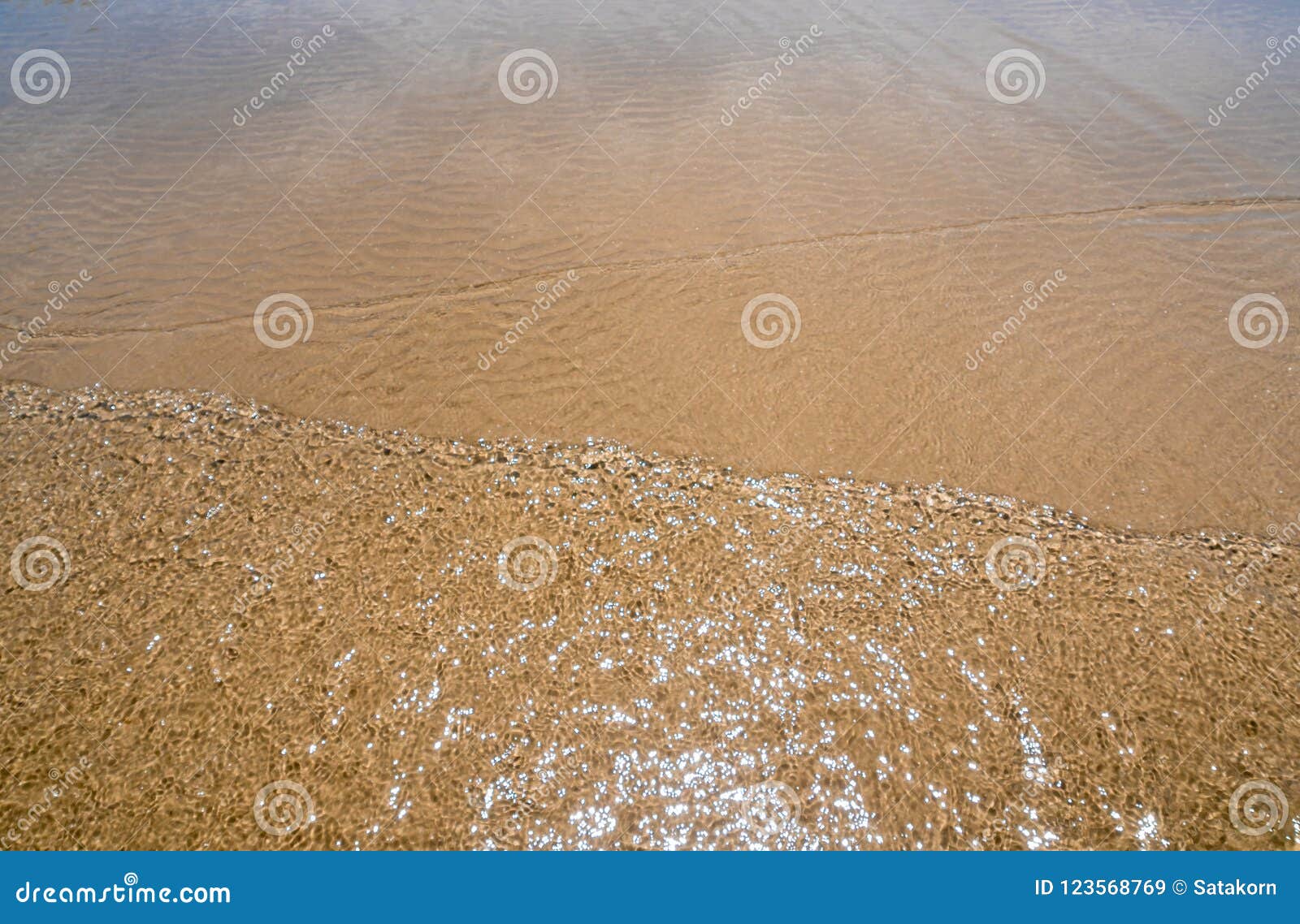Light Reflection on Surface of Movement Sea on Sand Beach Stock Image ...