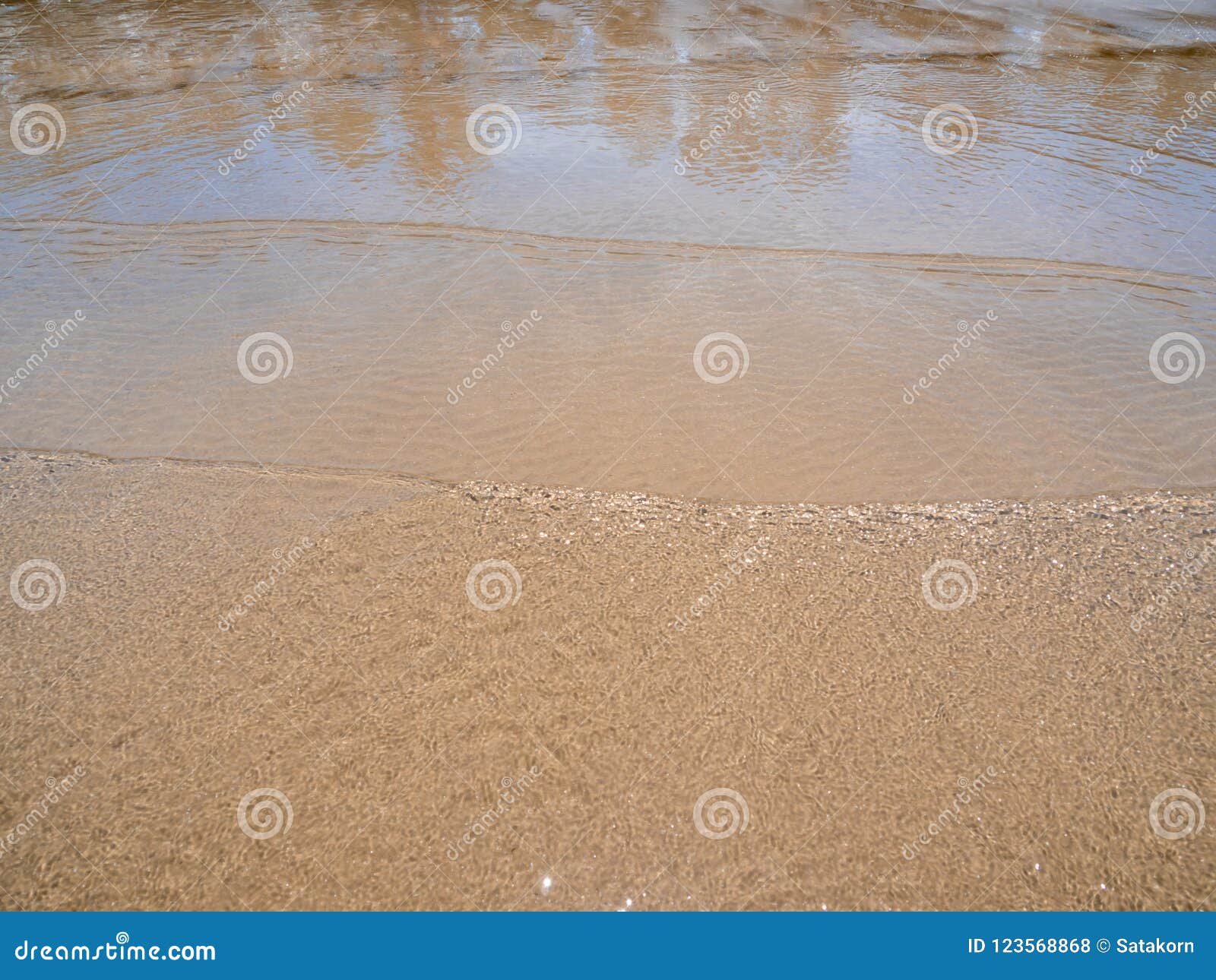 Light Reflection on Surface of Movement Sea on Sand Beach Stock Photo ...