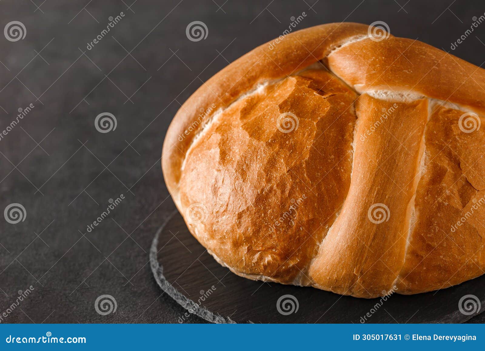 Light Round Loaf Bread Whole, Side View, on Dark Background, Selective ...