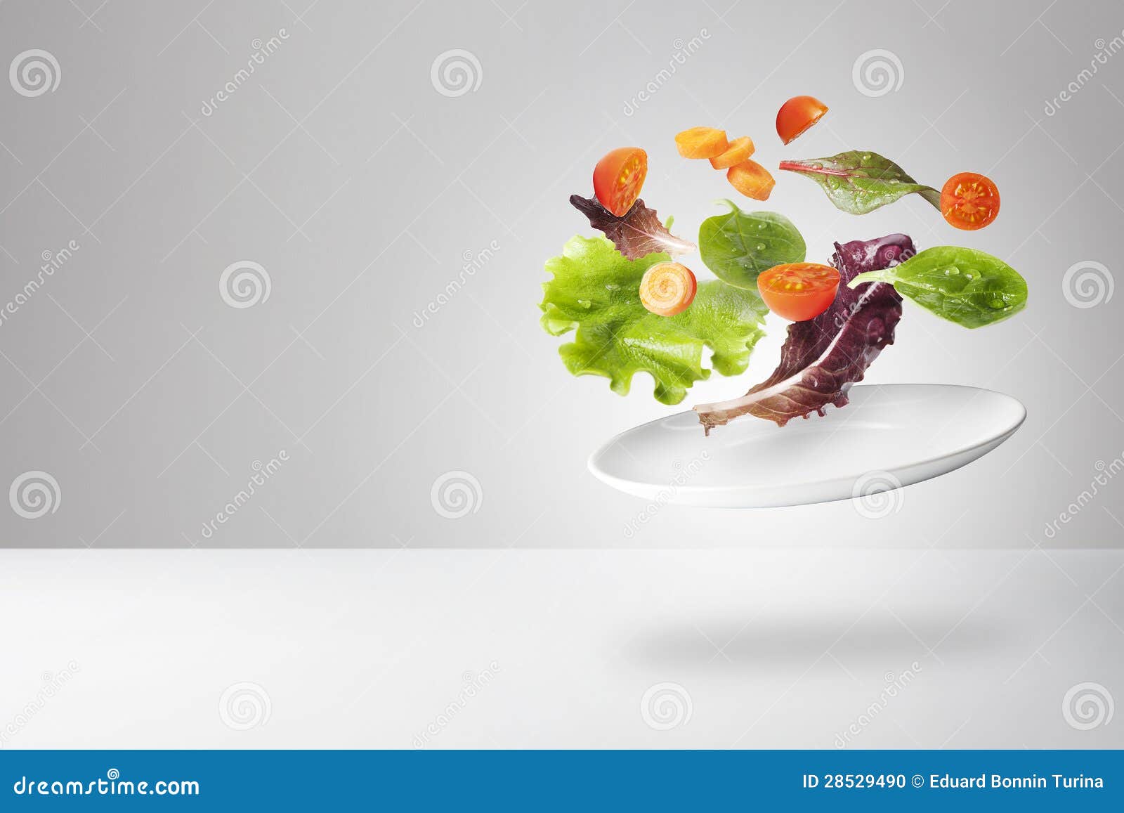 Light Salad with Floating Vegetables Stock Photo - Image of floating ...