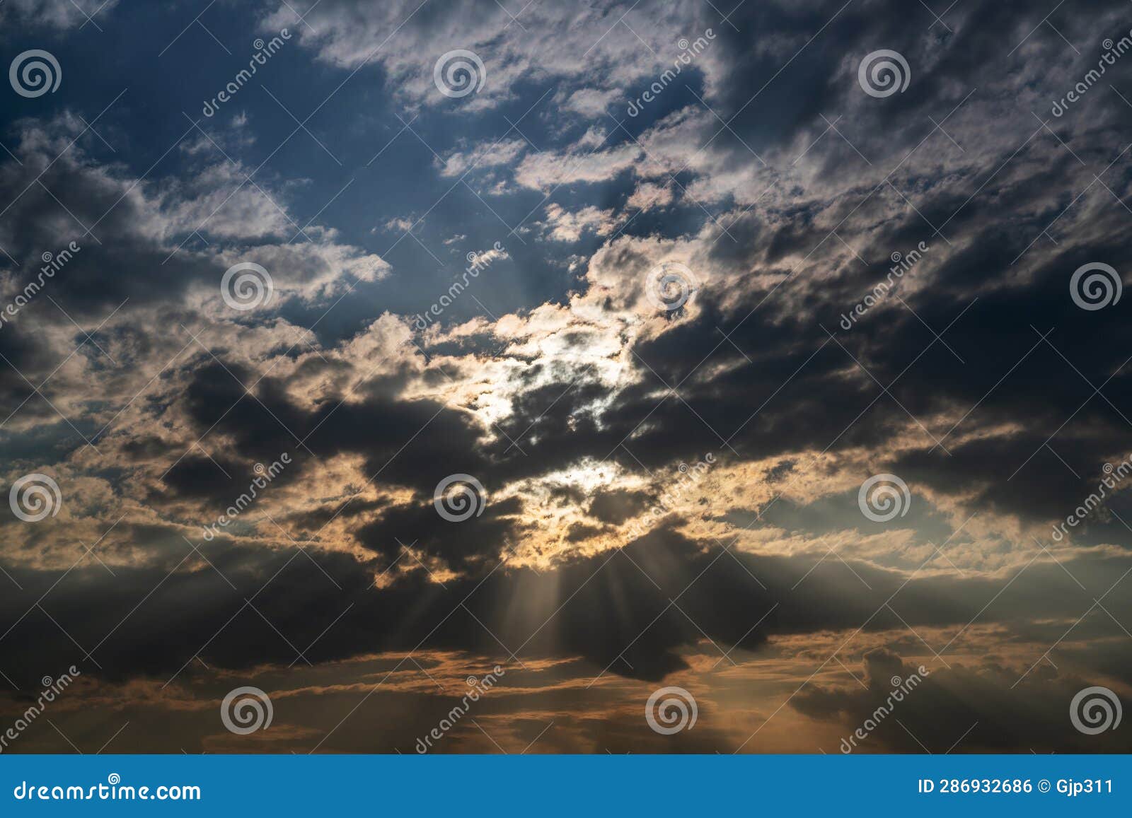 Setting Sun Shot Out of the Clouds Stock Photo - Image of view, outdoor ...