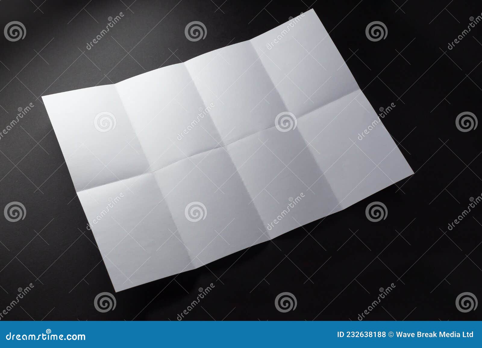 Light and Shadow on Creases in Sheet of White Paper Folded into Eight ...