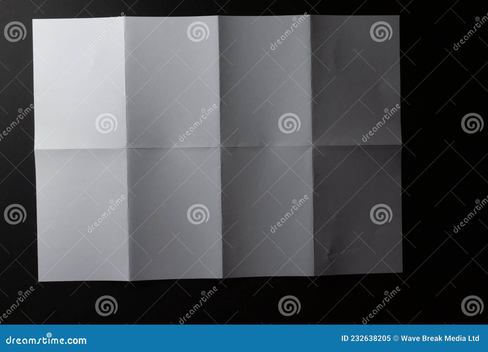 Light and Shadow on Creases in Sheet of White Paper Folded into Eight ...