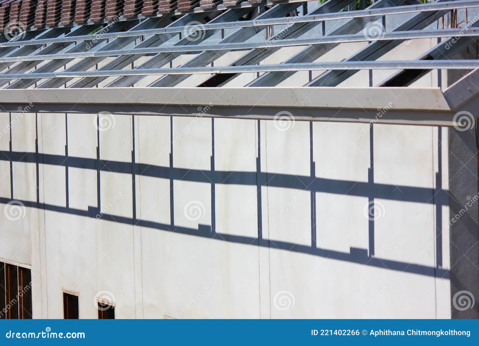 Light and Shadow of Roof Truss Steel Structure on Cement Wall in ...