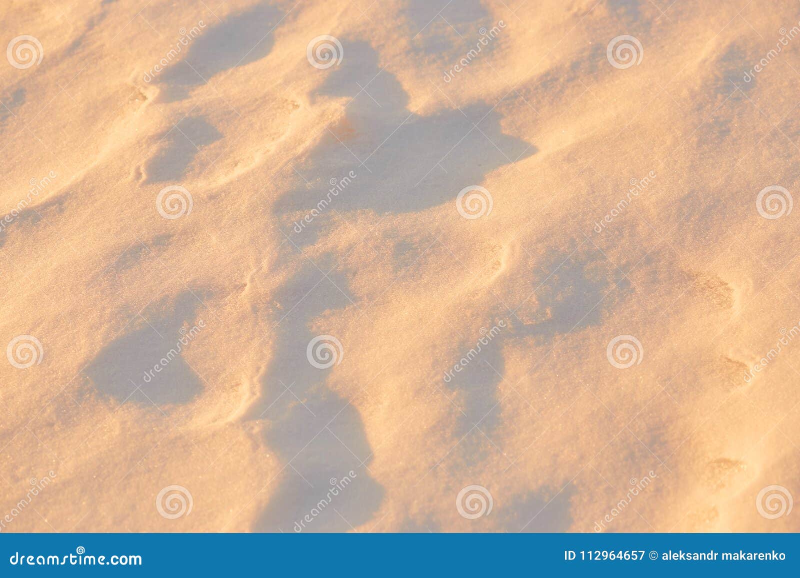 Light and Shadow on the Snow in the Golden Hour. Background. Stock ...