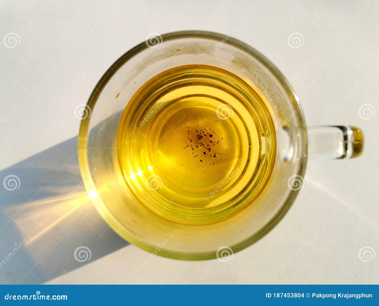 Light Shadow and Tea in a Clear Glass. Stock Photo - Image of yellow ...
