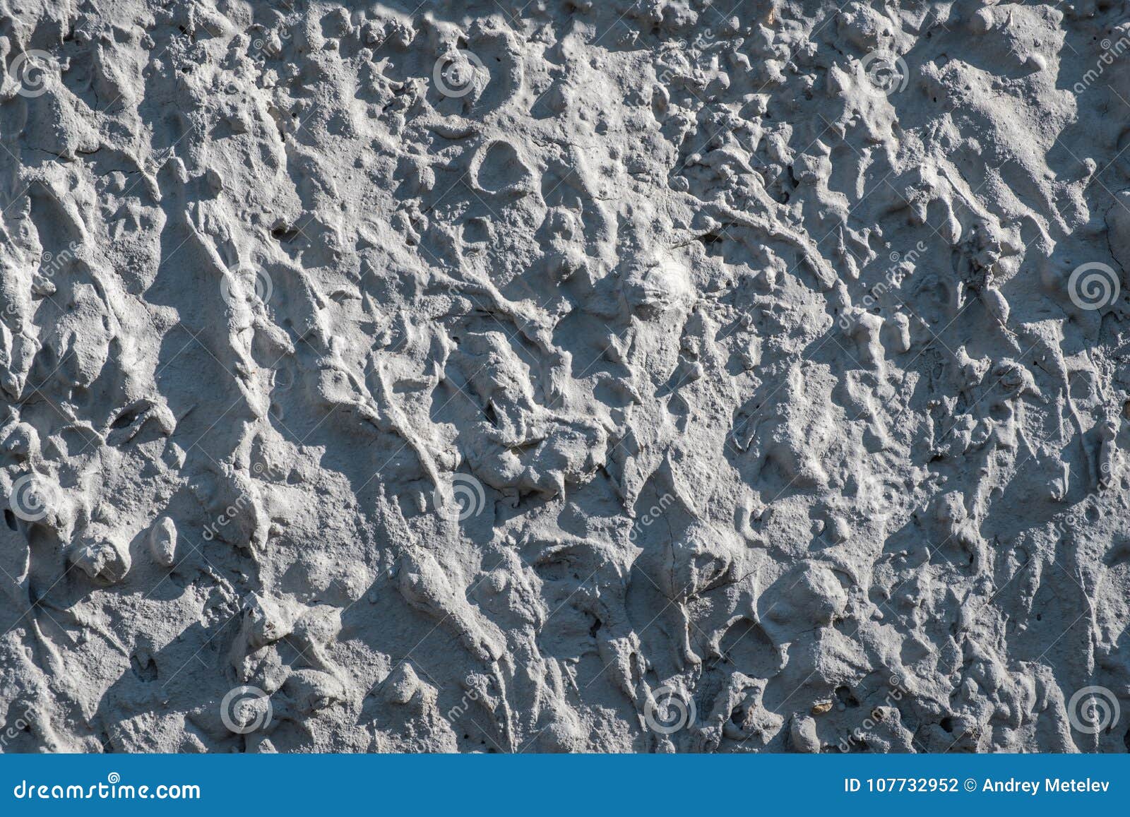 The Light and the Shadow of the Wall Made of Stones Plastered, Rough ...