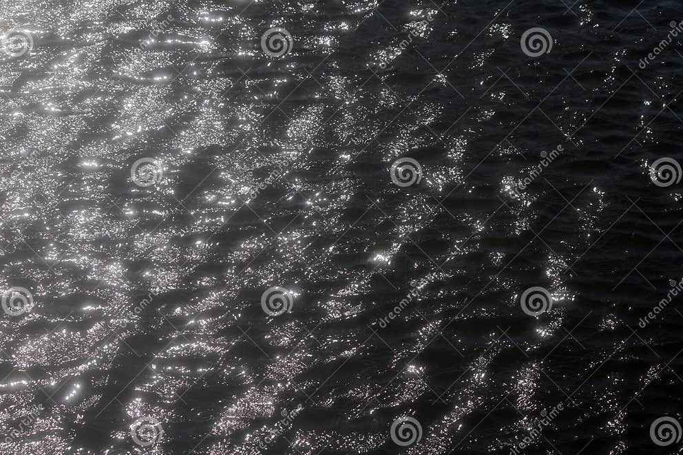 LIGHT SHIMMER on WATER stock photo. Image of background - 100079736