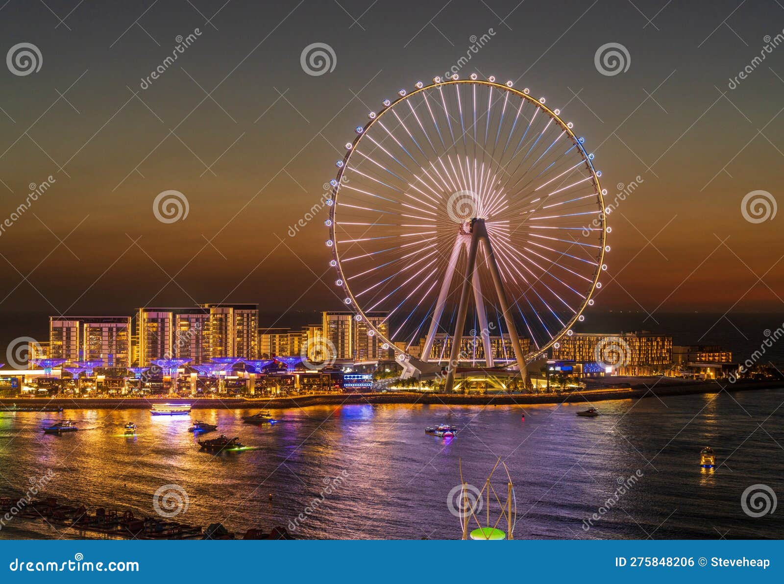 Light Show on Ain Dubai Observation Wheel at Sunset Stock Photo - Image ...