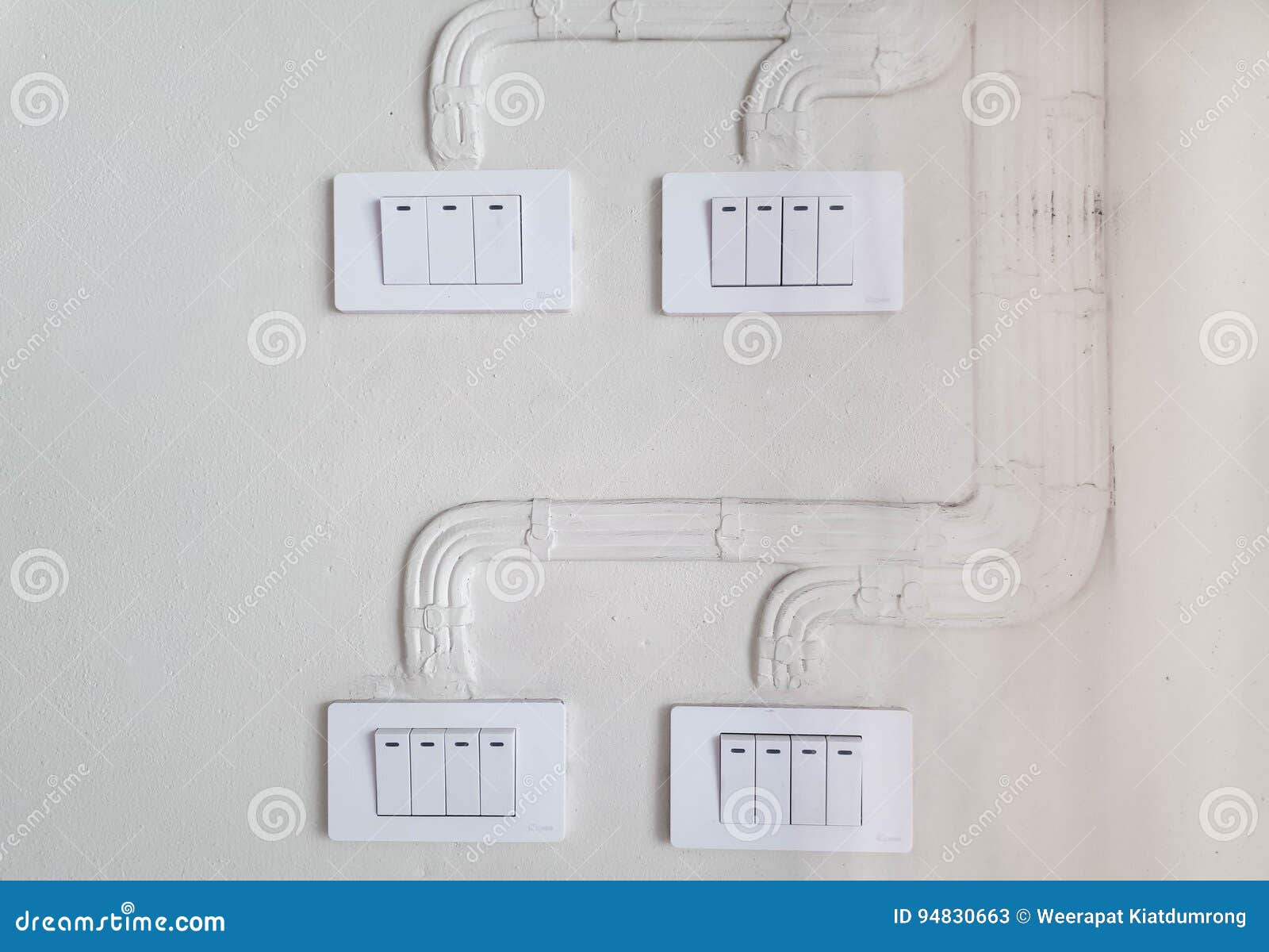 Two Switch Buttons And A Female Connector On A Plaster Wall In Waiting ...