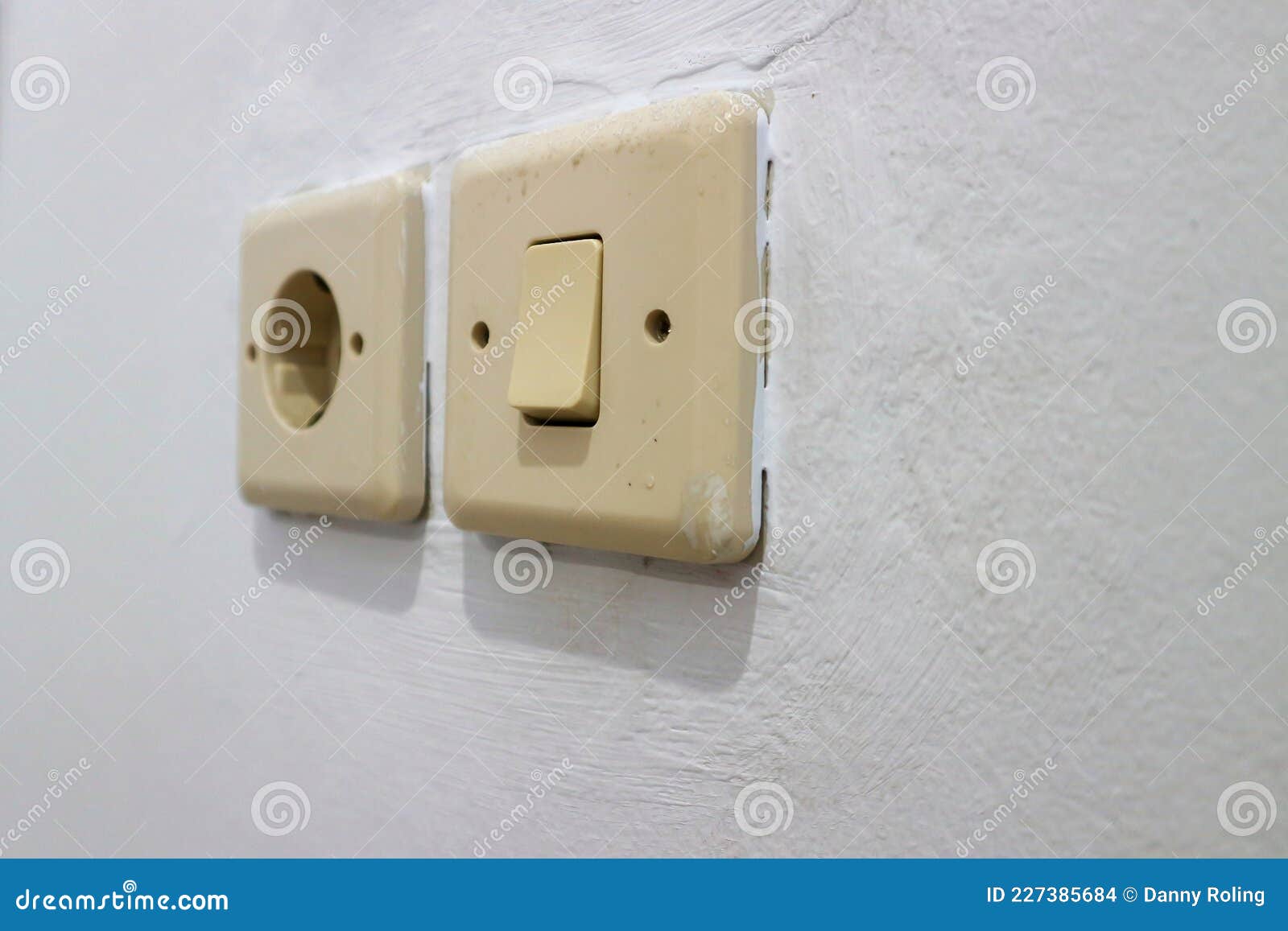 Light Switch and Electric Plug on the Wall Stock Photo - Image of ...